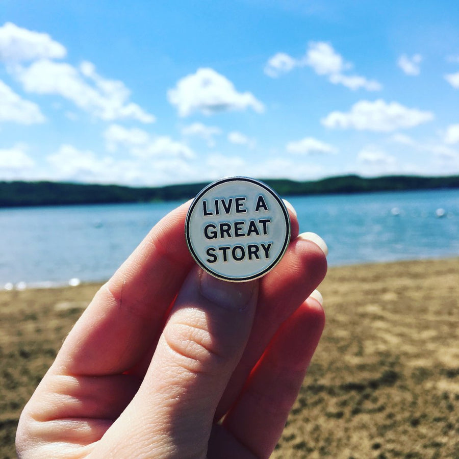 LIVE A GREAT STORY Enamel Pin